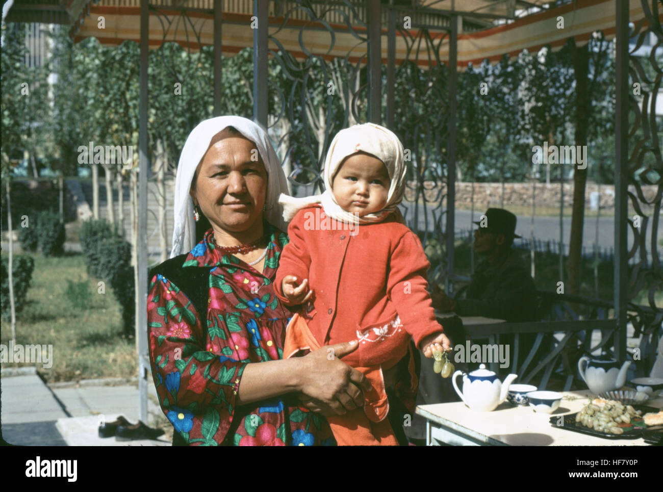 An Uzbek mother and child from Tashkent, Uzbekistan, wearing a scarf ...