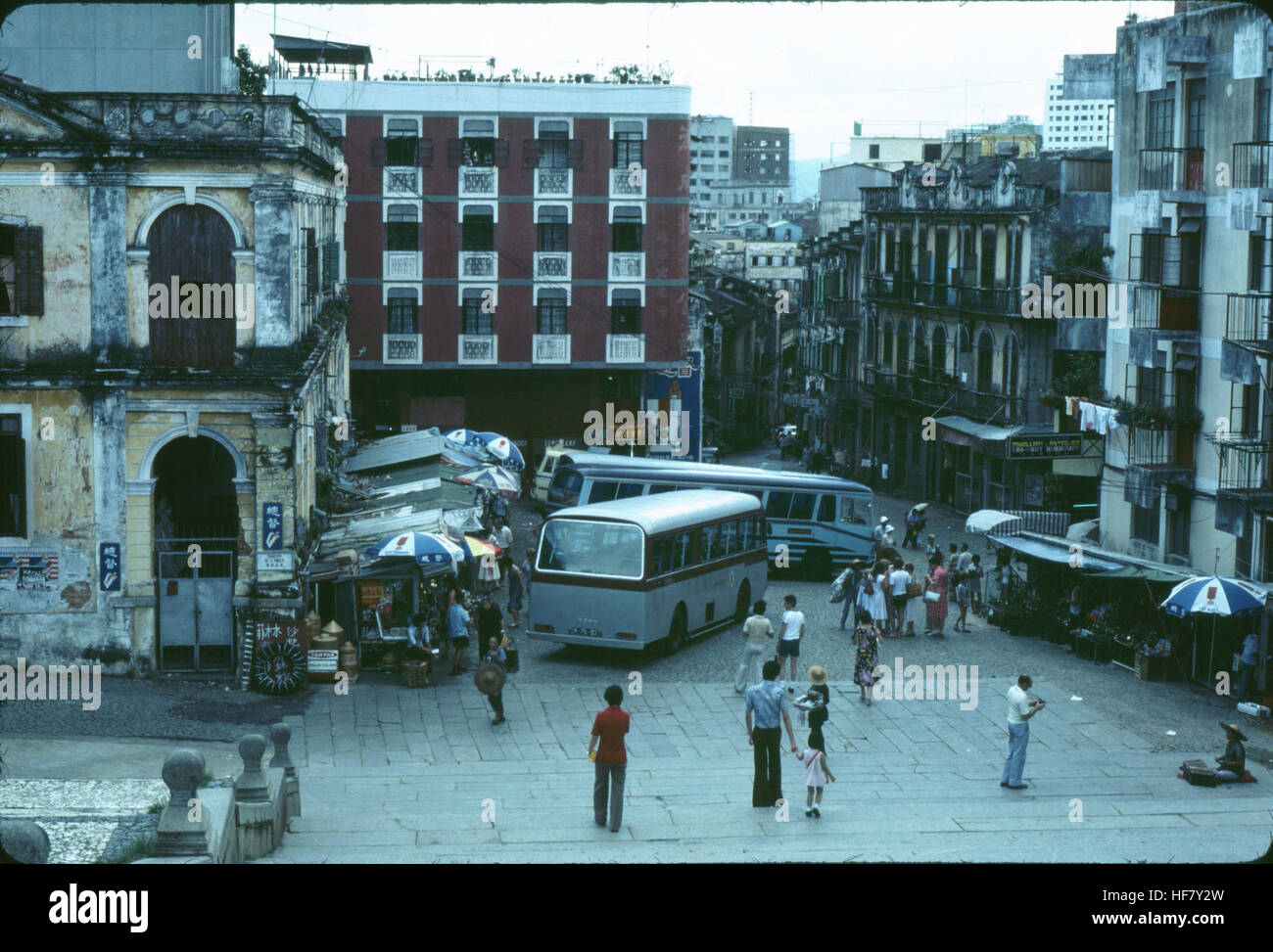 This street scene in Macau, located across the Pearl River Delta from ...