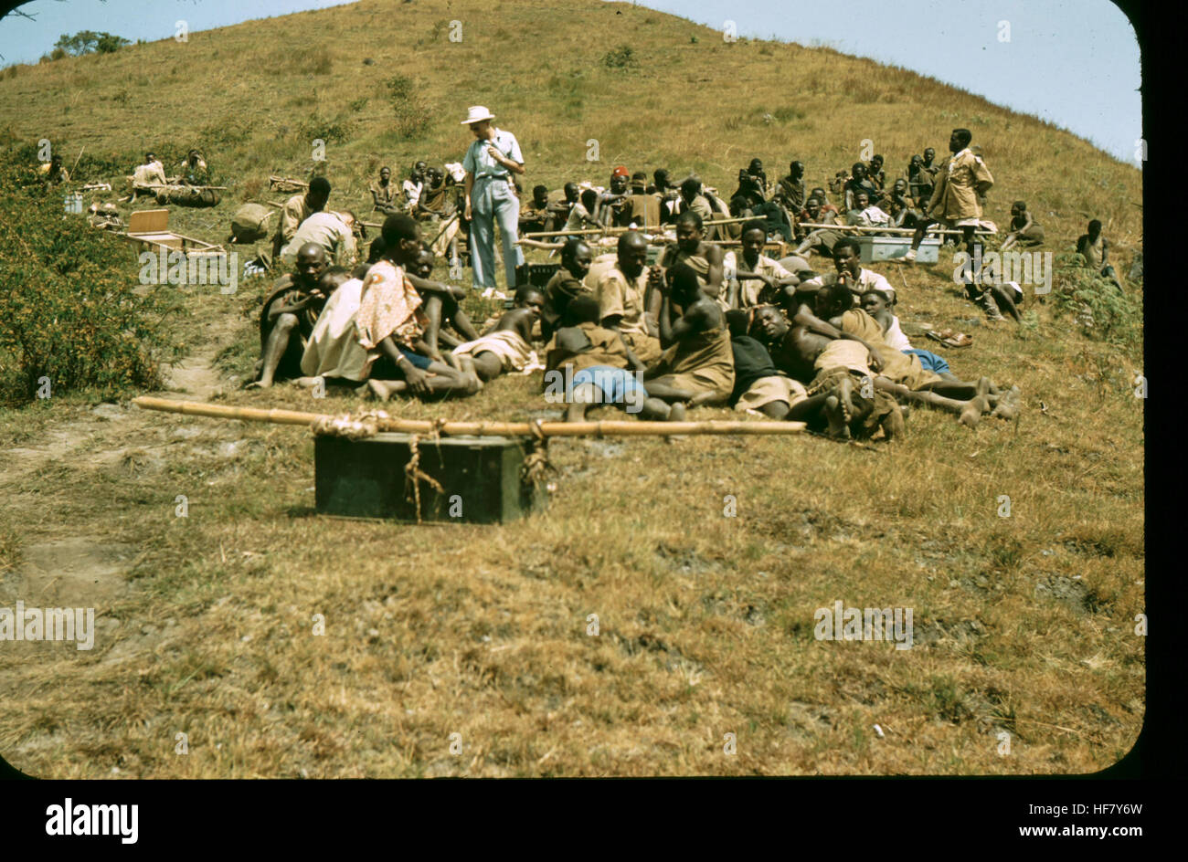 The photograph shows a caravan resting at the slope of Mt. Muhi in the ...