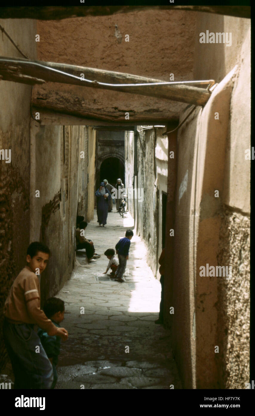 A narrow alleyway in the Medina of Marrakesh, Morocco, depicting the ...