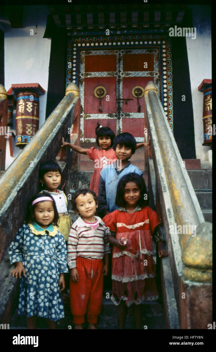 This image captures children on the staircase of a Buddhist temple in ...