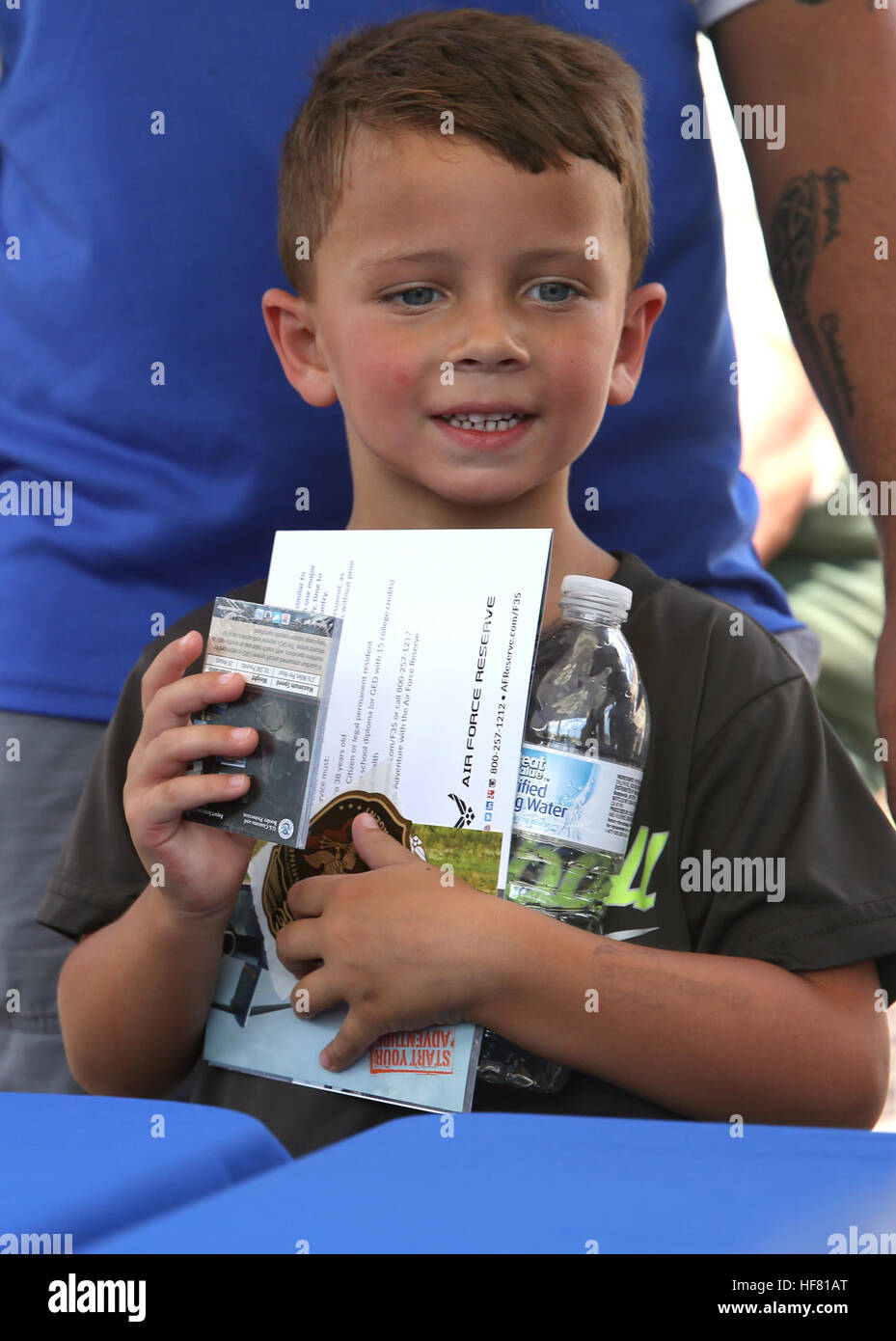 Brayden Olson, 9, of Tabernacle, N.J., clutches freebies he received ...