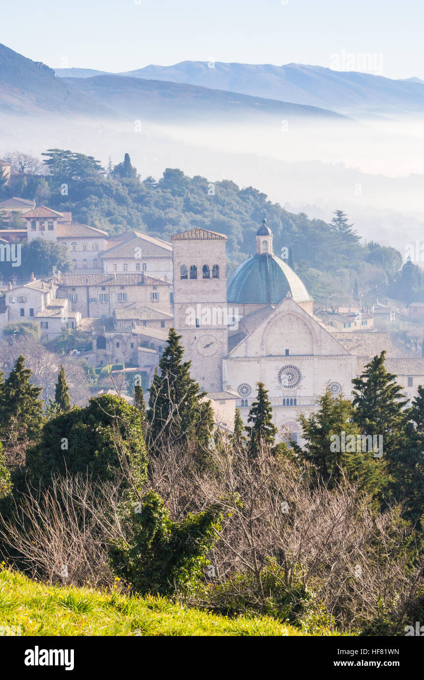 Assisi in the fog, and the Cathedral of San Rufino, Perugia province ...