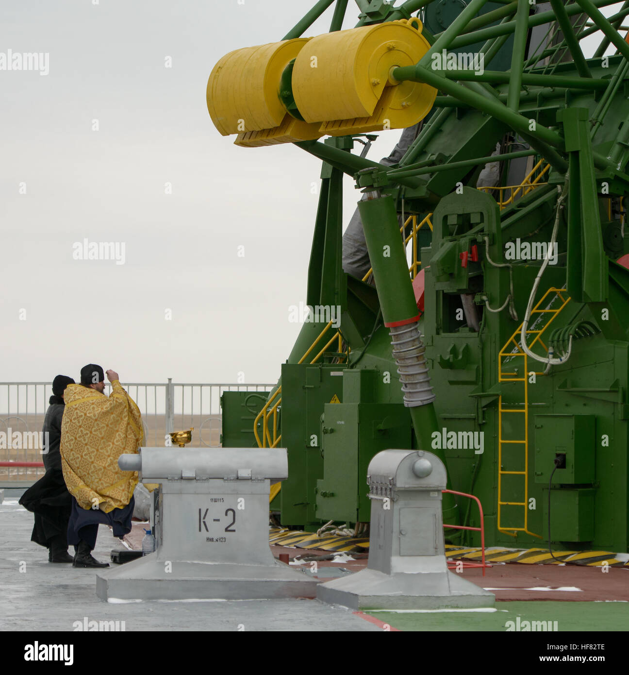 An Orthodox priest blesses the Soyuz rocket at Baikonur Cosmodrome ...
