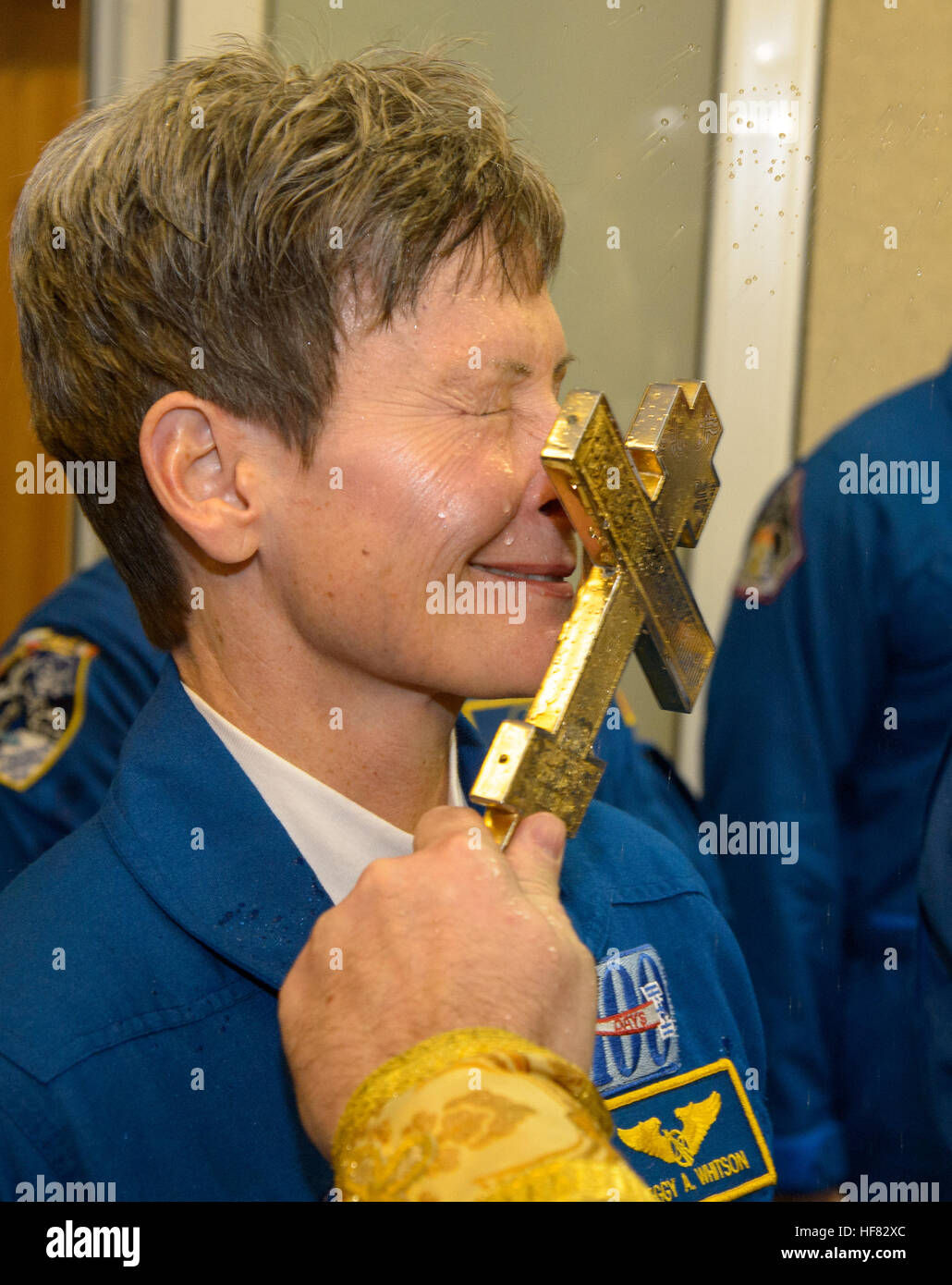 Expedition 50 NASA astronaut Peggy Whitson receives a traditional ...