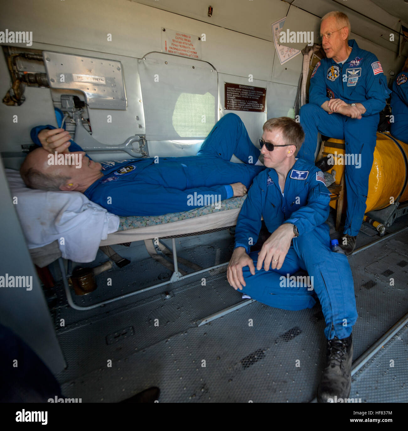 Expedition 48 NASA astronaut Jeff Williams rest in a Russian MI-8 ...