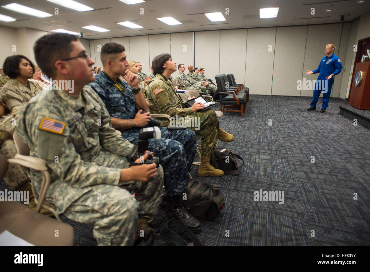 NASA astronaut Tim Kopra gives a talk at the Defense Information School ...