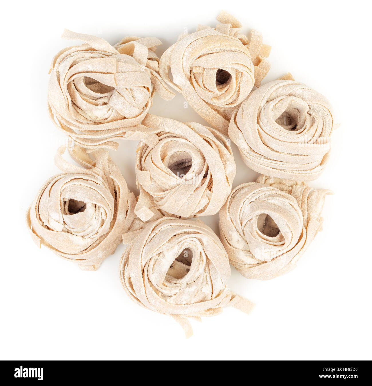 Homemade rolled traditional italian pasta tagliatelle in star form ...