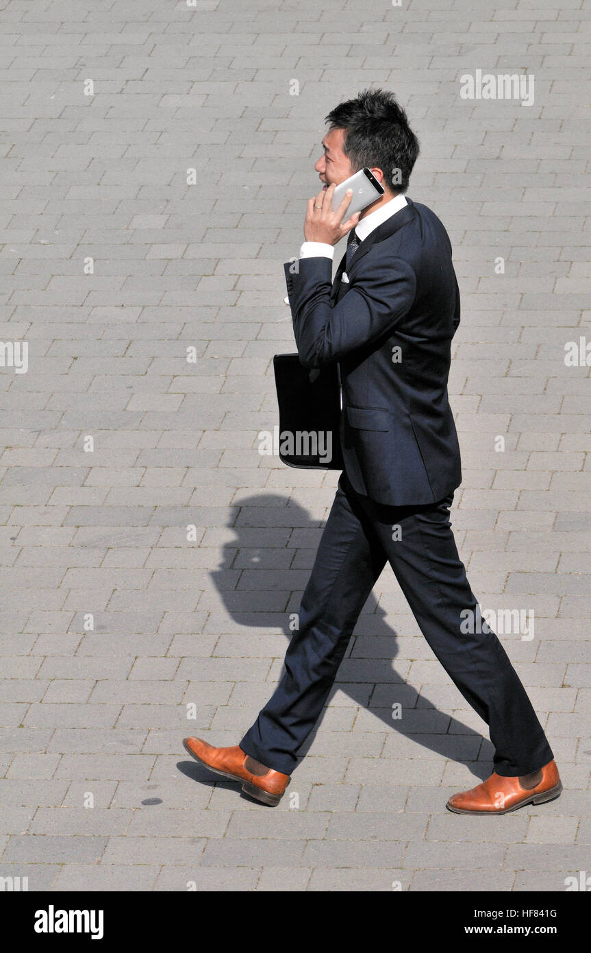Man making a phone call with mobile phone,Europe square, Fira de ...