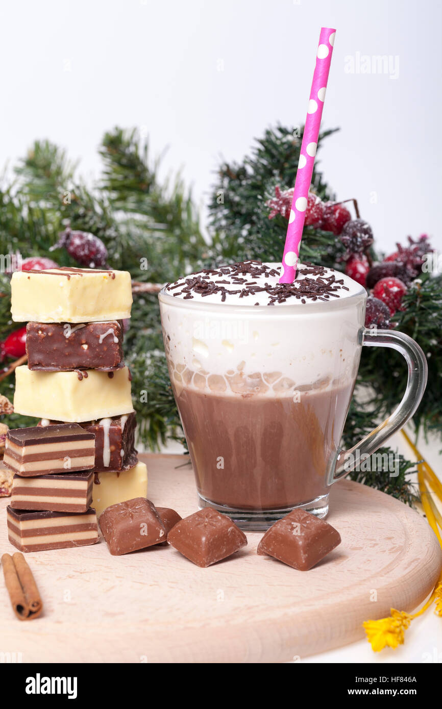 Hot chocolate in a glass and biscuits on the table Stock Photo - Alamy