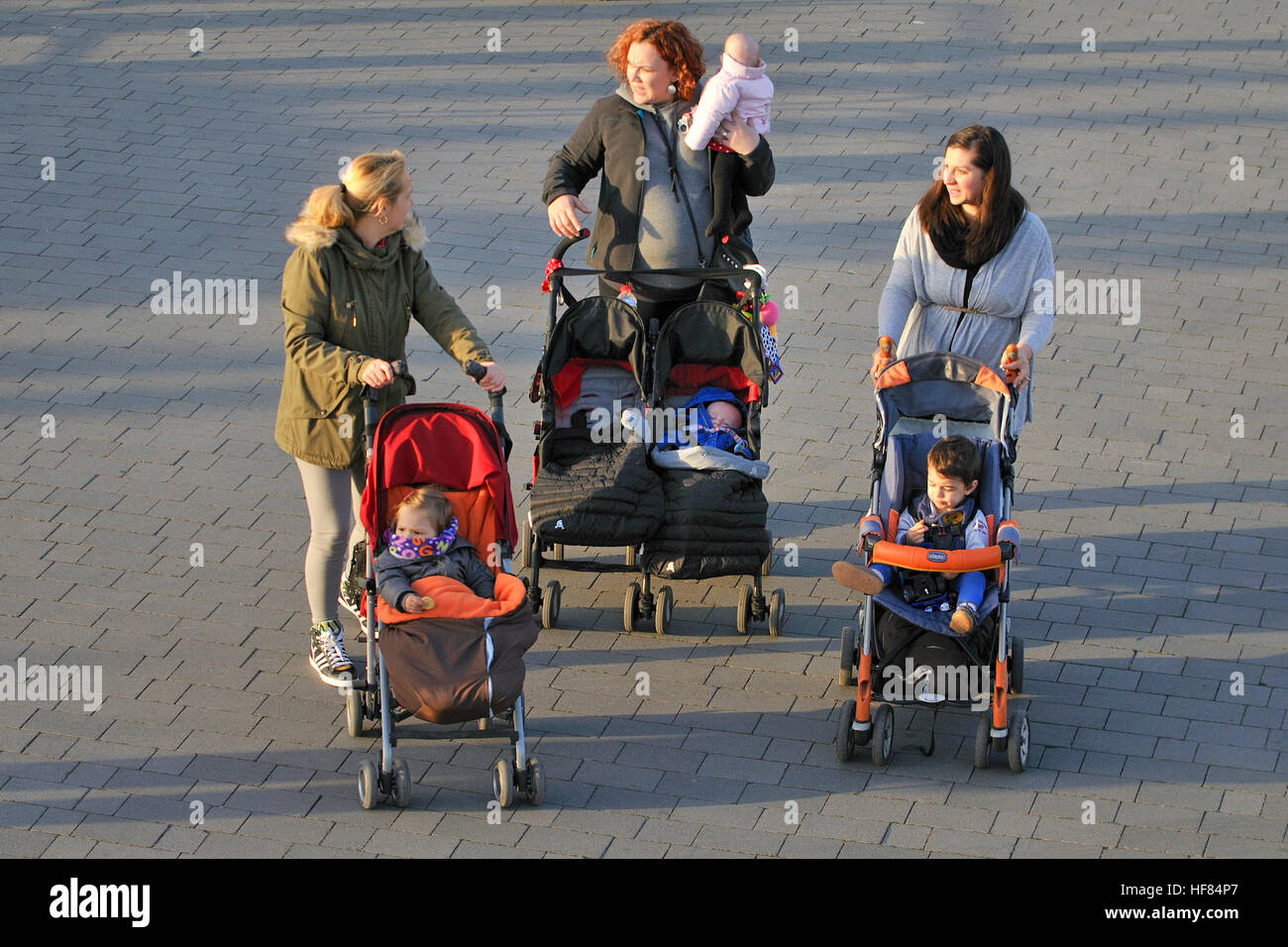 Women with baby strollers Stock Photo - Alamy