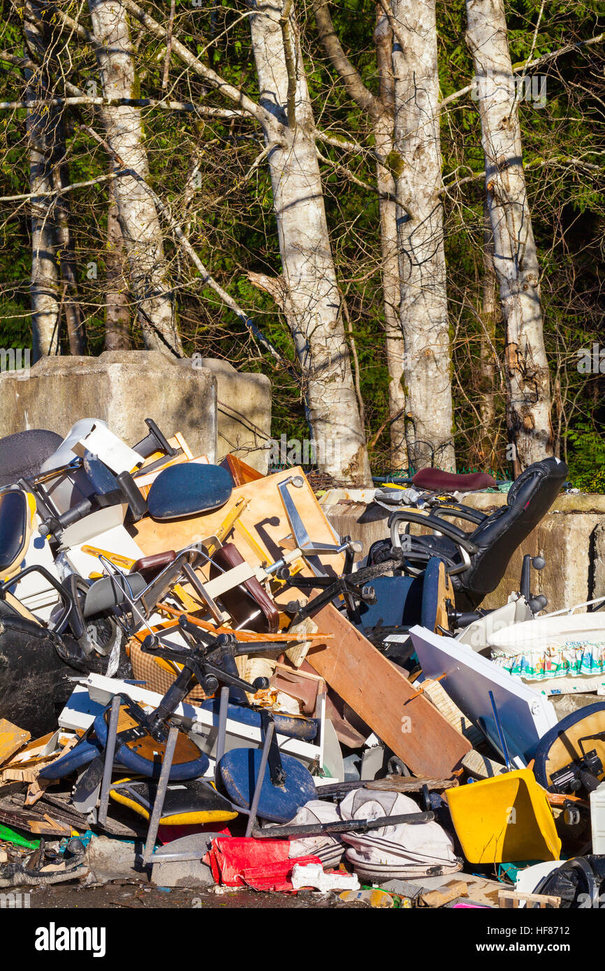 Pile of office garbage and chairs for recycling Stock Photo - Alamy