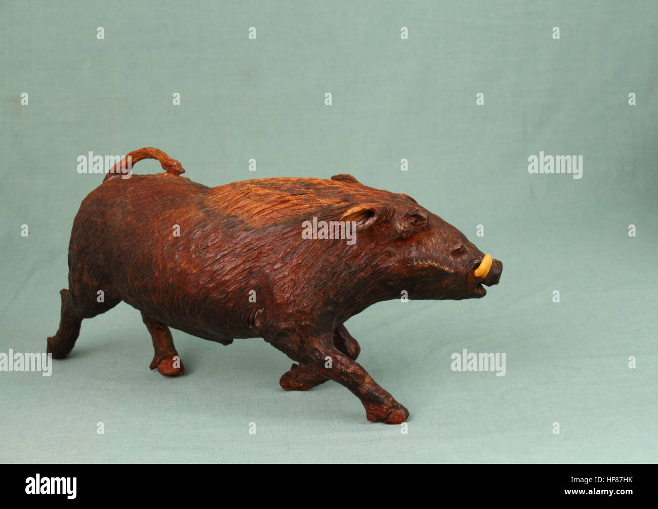 African curio - wood carving of a wild animal isolated on a clear ...
