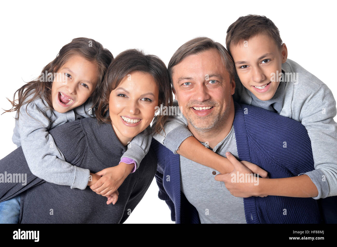 Happy family of four Stock Photo - Alamy