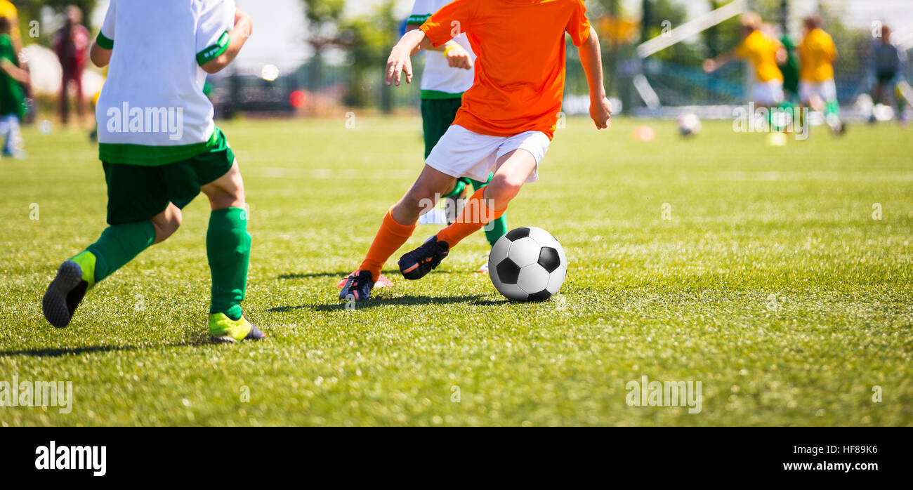 Boys Kicking Soccer Ball. Children Soccer Team. Kids Running with Ball ...