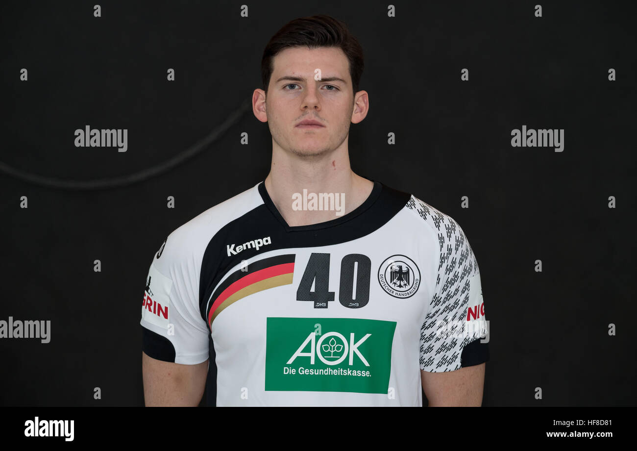 Kamen, Germany. 28th Dec, 2016. German national handball team player Simon Ernst poses for a ...