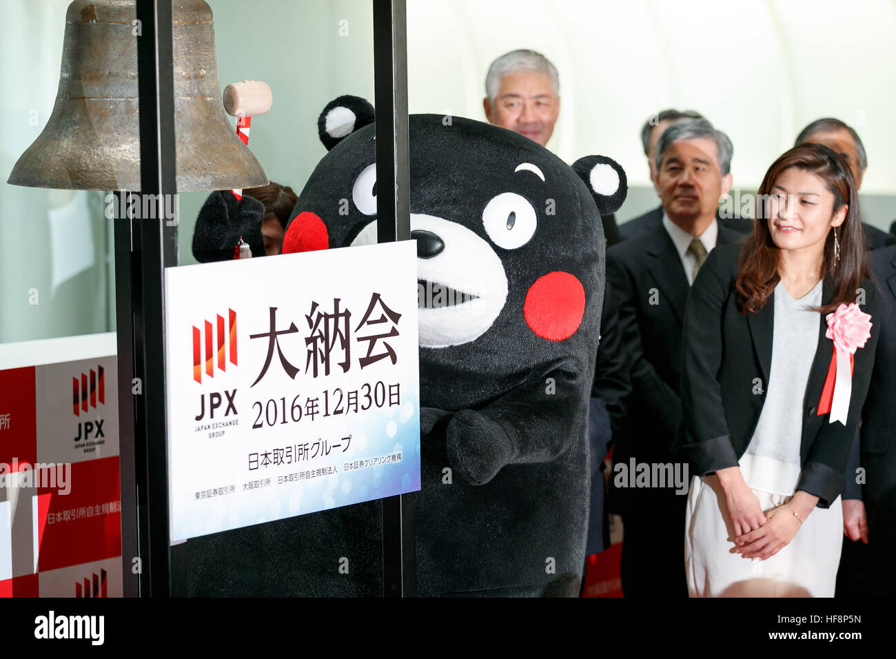 Kumamoto prefecture's mascot Kumamon rings the bell during the final ...