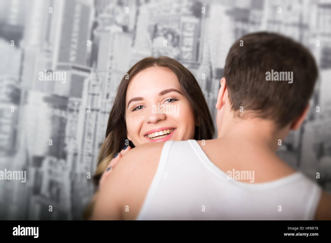 Happy young couple enjoying an intimate moment Stock Photo - Alamy
