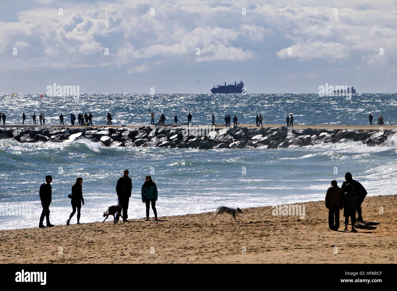 People at Barcelona beach Stock Photo - Alamy
