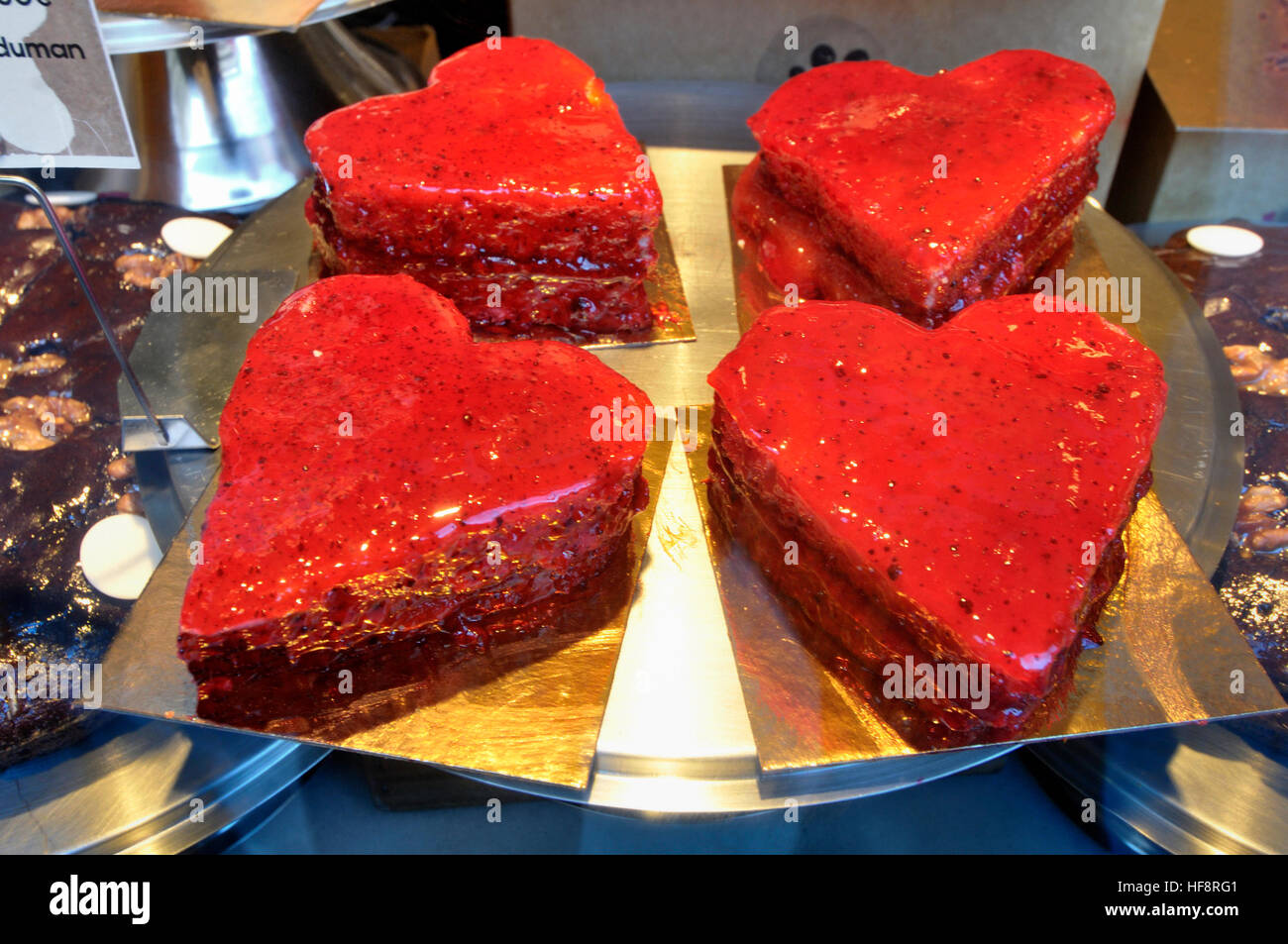 Small red heart-shaped cakes Stock Photo - Alamy