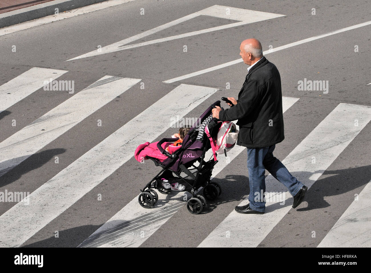 Old man with Baby carriage Stock Photo - Alamy