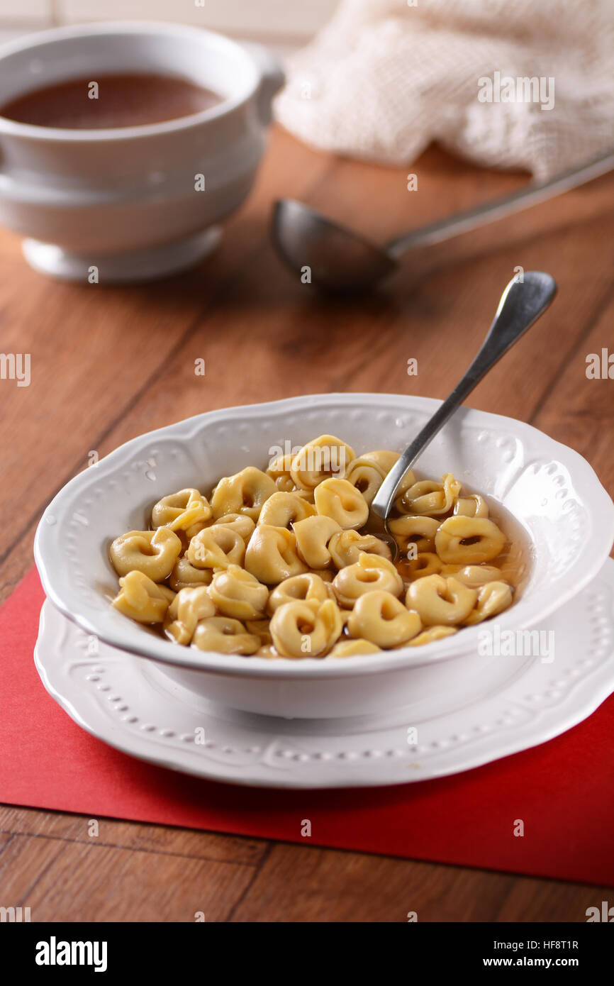 tortellini in broth - traditional Italian food Stock Photo - Alamy