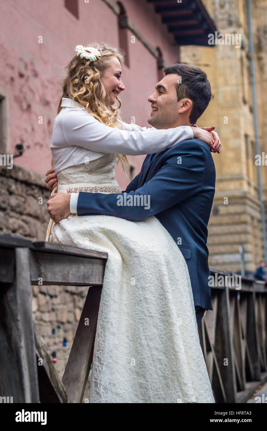 newlyweds strolling around the city Stock Photo - Alamy