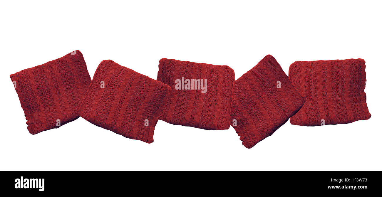 red knitted pillows isolated on white background Stock Photo - Alamy