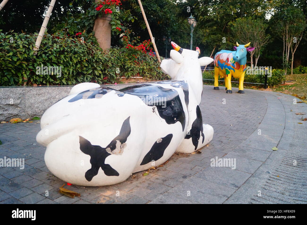 Cow's sculpture landscape, in the park, very beautiful Stock Photo - Alamy