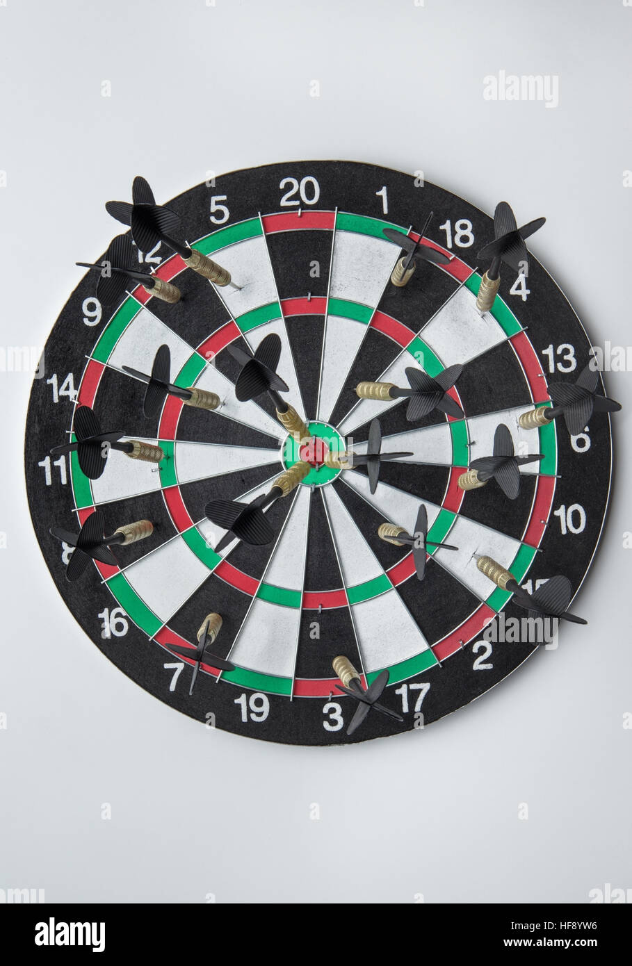 many darts on a dart board Stock Photo - Alamy