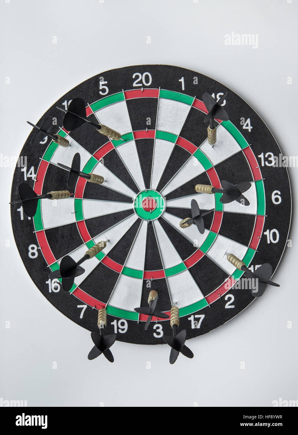 many darts on a dart board Stock Photo - Alamy