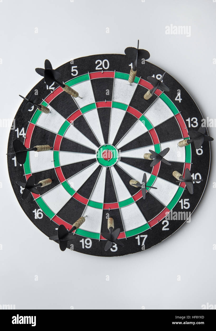 many darts on a dart board Stock Photo - Alamy