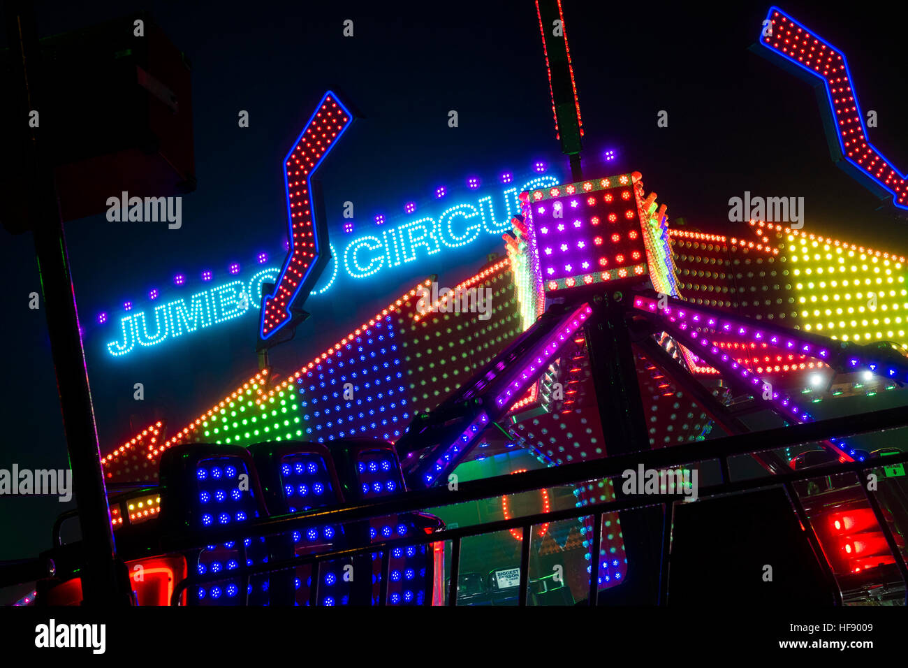 A Funfair at night uk Stock Photo - Alamy