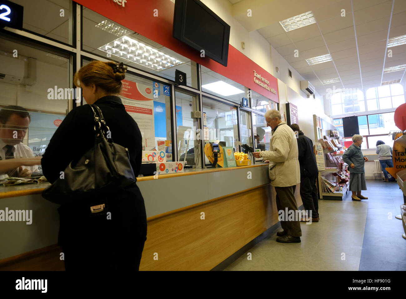 Customers at the Aberystwyth Crown post office ( interior) , in the ...