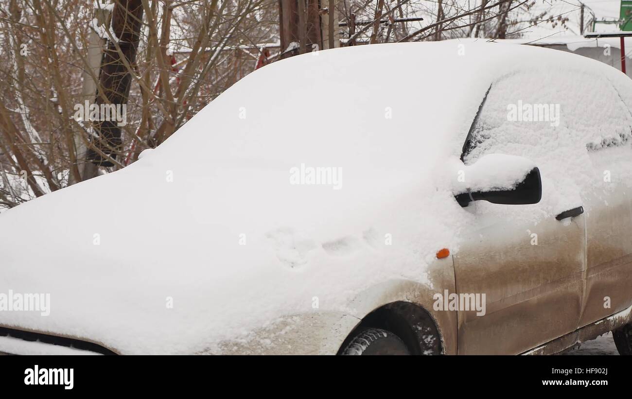 car under snow in the winter bad weather Stock Photo - Alamy