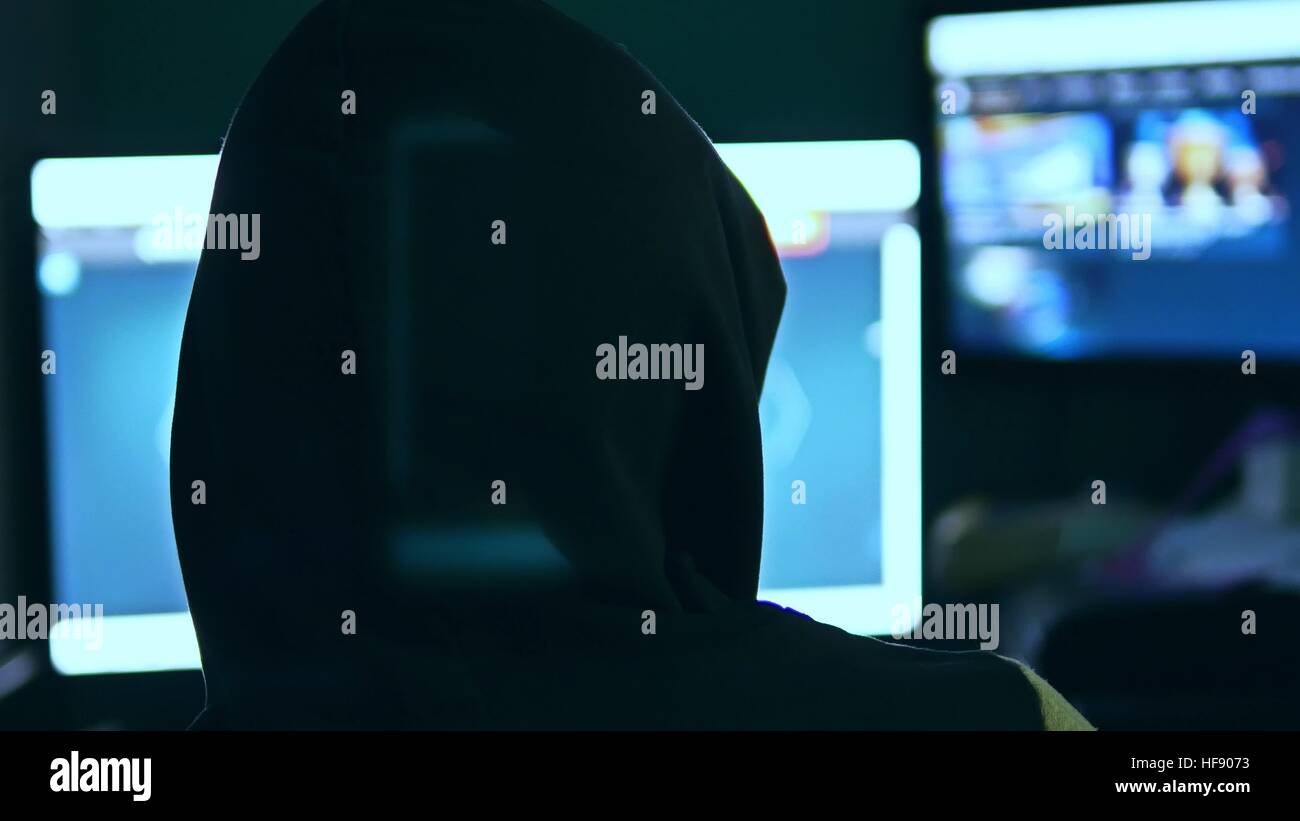 Hacker man trying breach security hi-res stock photography and images ...