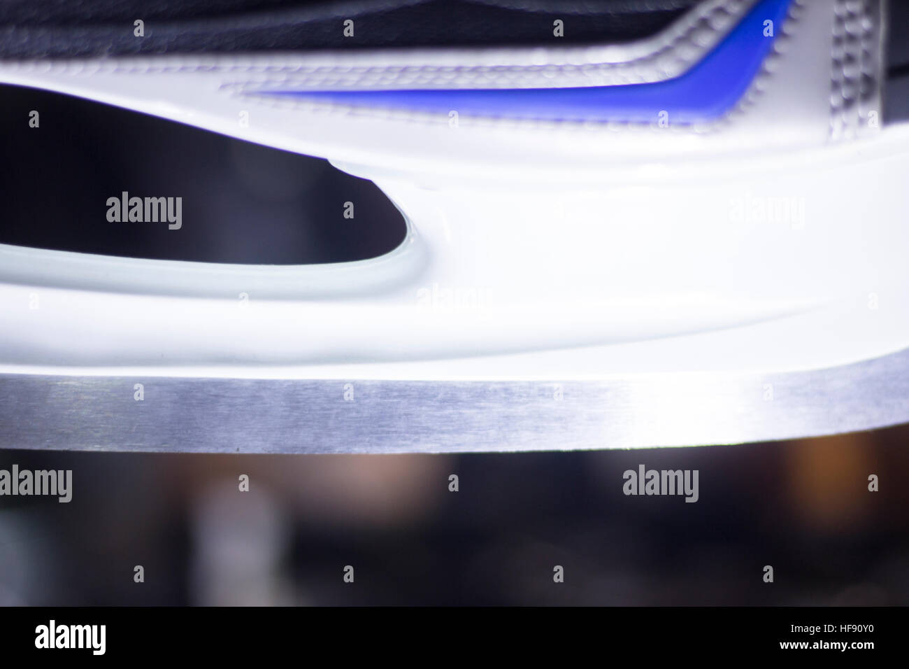 Ice skates in skate store shop window on display on sale for skating on ...