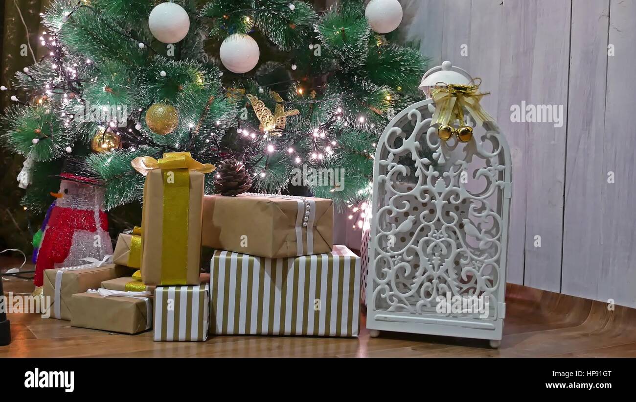 Christmas gifts interior tree and New Year toys blinking room lights ...