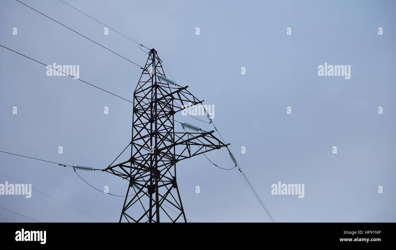 Electrical tower with cables against gray electricity background Stock ...