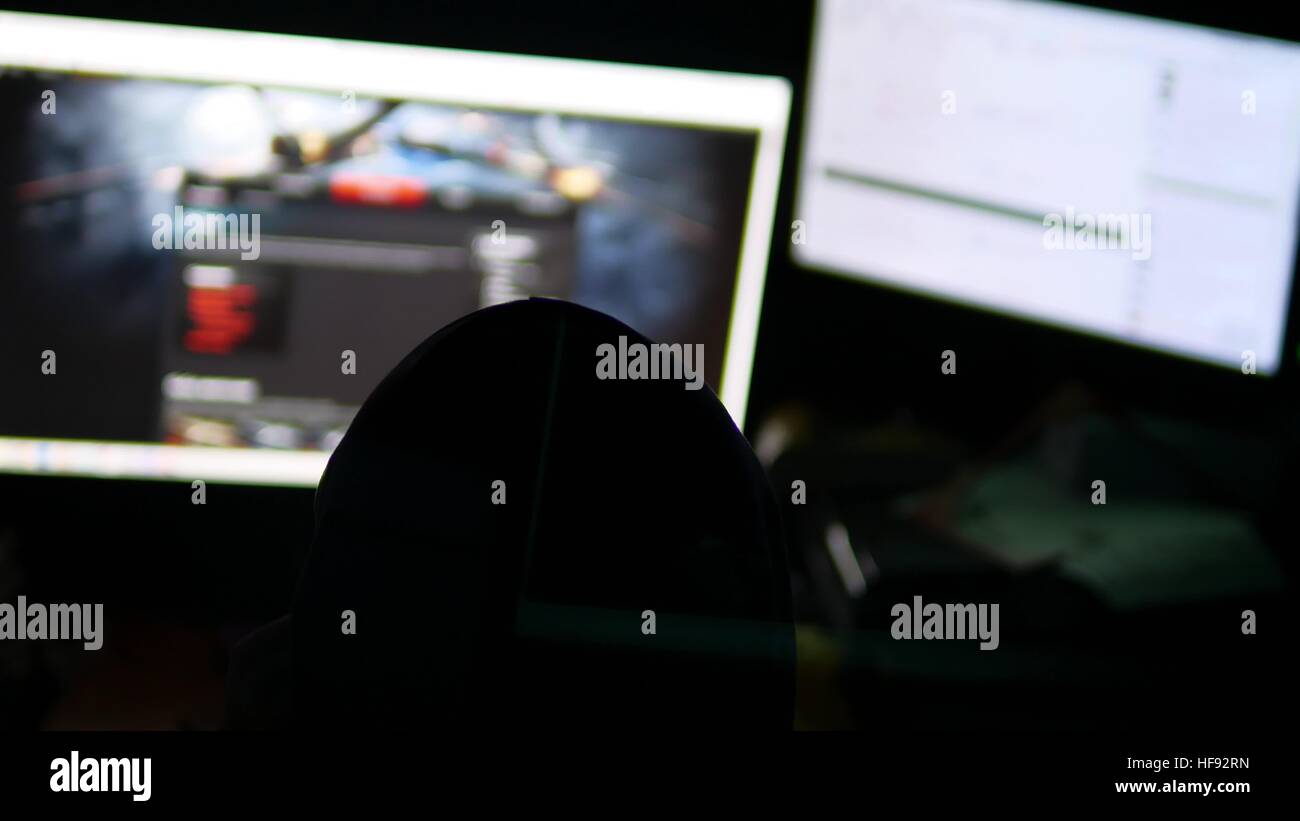 Hacker man trying breach security hi-res stock photography and images ...