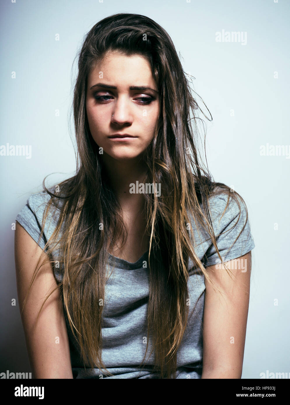 problem depressioned teenage with messed hair and sad face, real junky ...