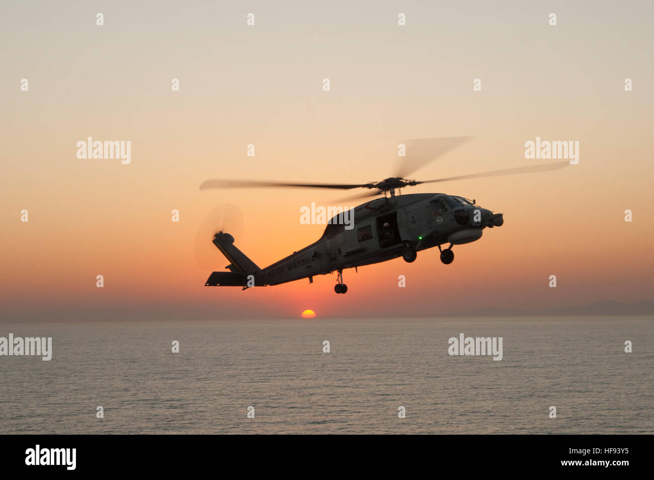 A Brazilian S-70B Seahawk helicopter prepares to land aboard the future ...