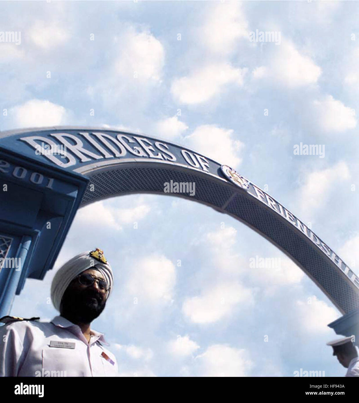 An Indian Naval Officer stands at the gate of the Naval Base, Mumbai ...
