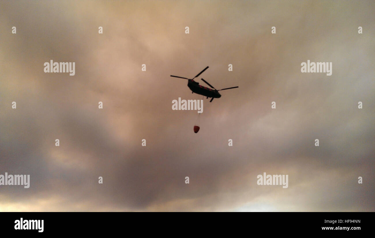 A California National Guard CH-47 Chinook helicopter launches from the ...