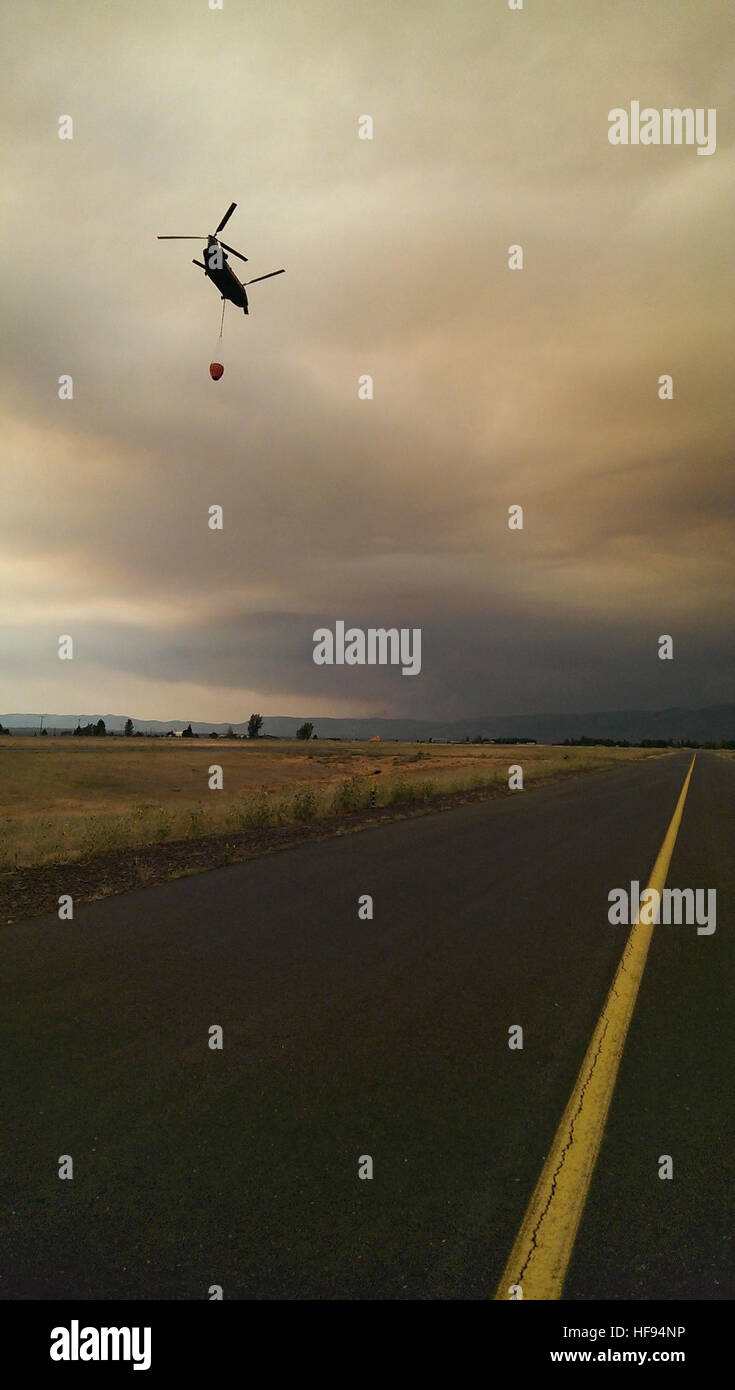 A California National Guard CH-47 Chinook helicopter launches from the ...