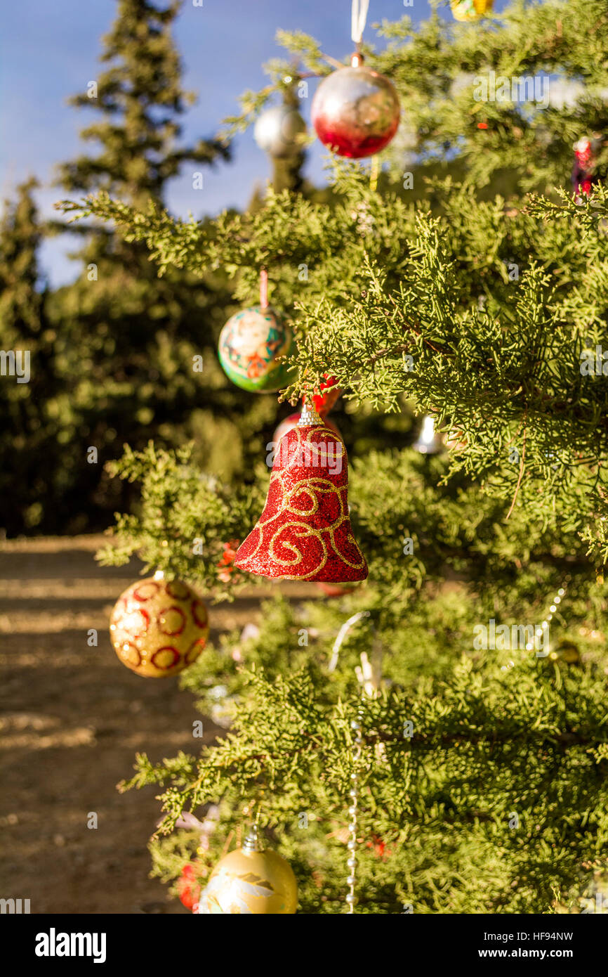 Decorated Christmas tree in the forest at nature background Stock Photo ...