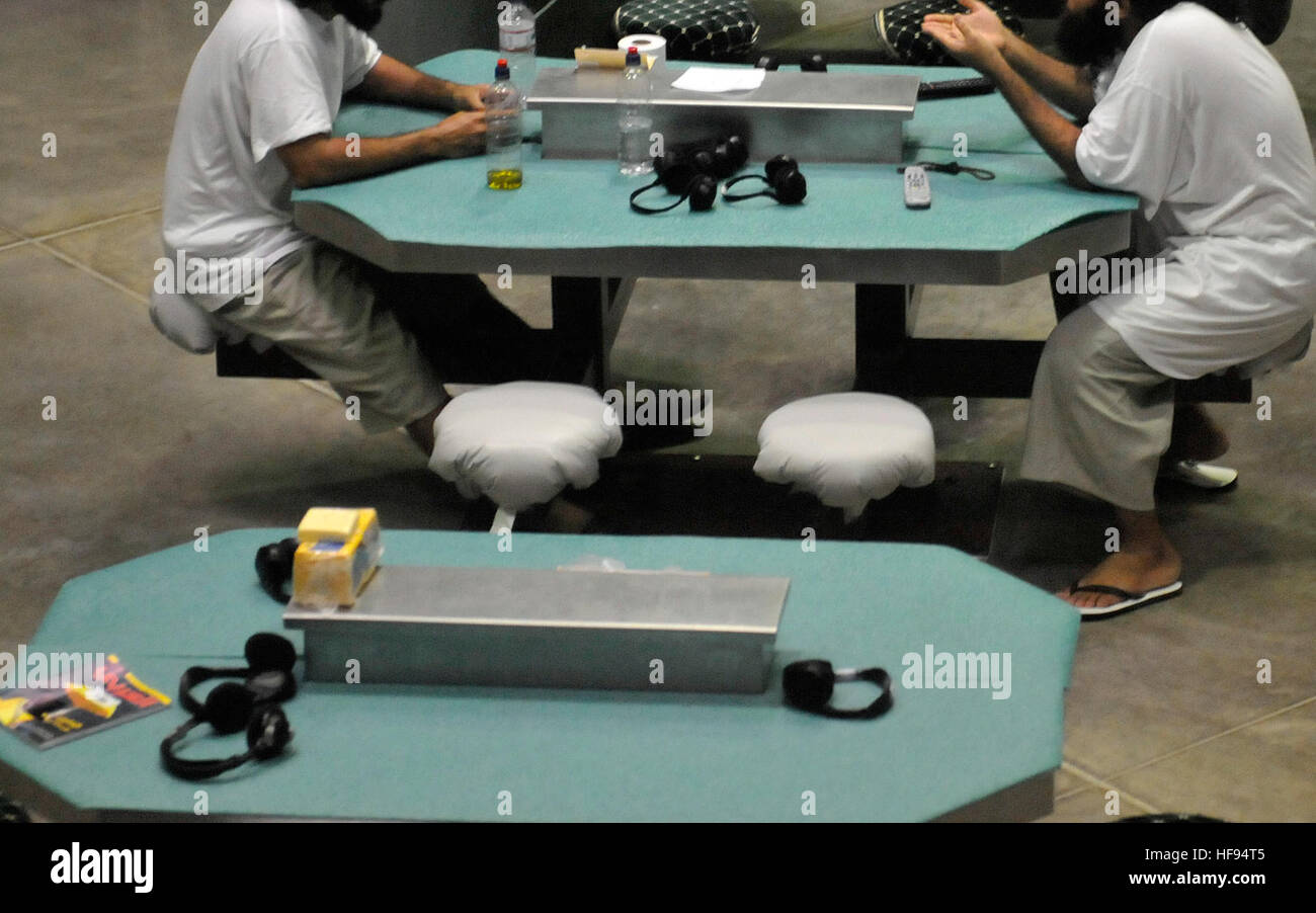 Two detainees are seen inside a communal area of Camp Six at Guantanamo ...