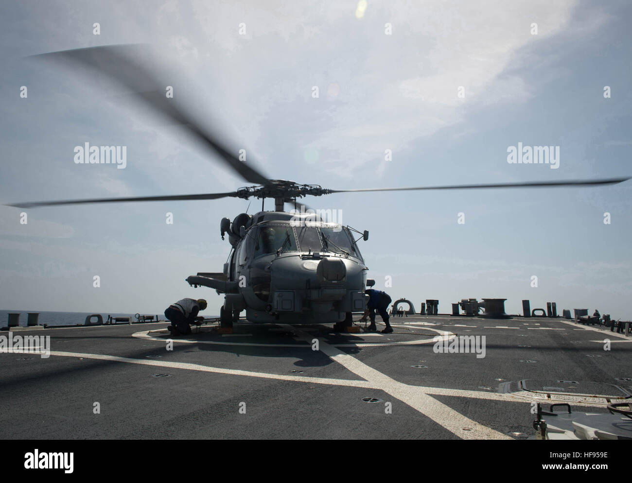 An MH-60R helicopter from HSM-73 lands aboard USS Curtis Wilbur during ...