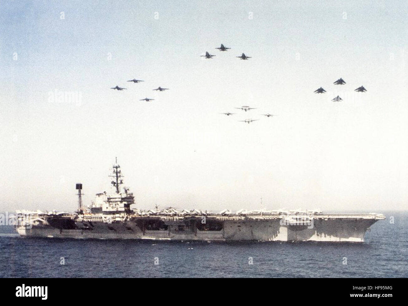 Carrier Air Wing 1 aircraft fly over USS America (CV-66) in 1991 Stock ...