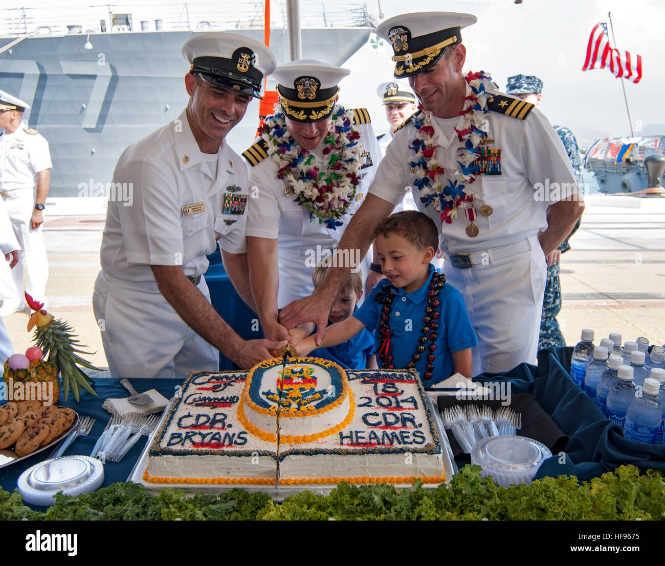 From left, Command Master Chief Matthew Logsdon, Cmdr. Jeffrey Heames ...